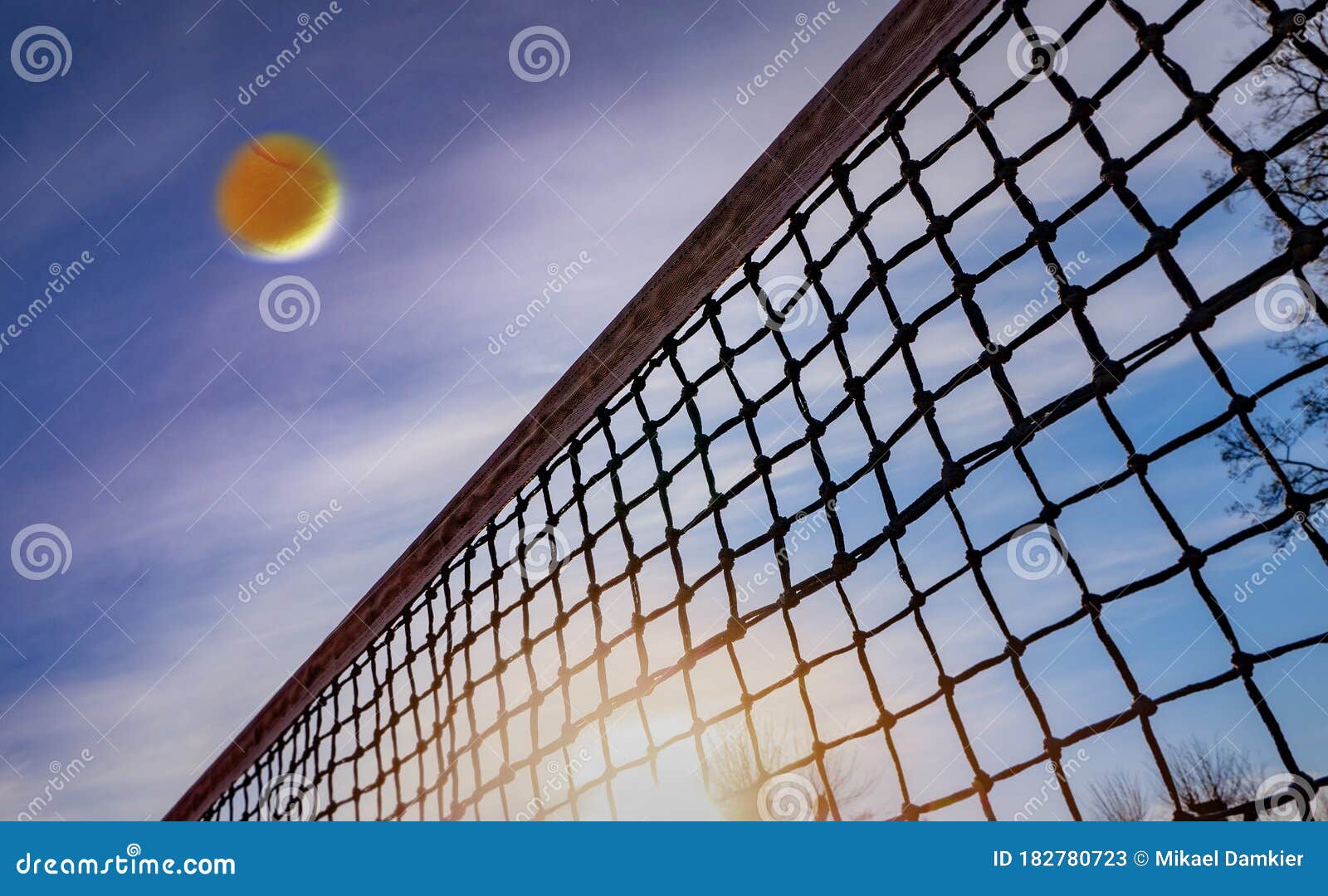 Tennis Ball over Net stock image. Image of outdoors - 182780723