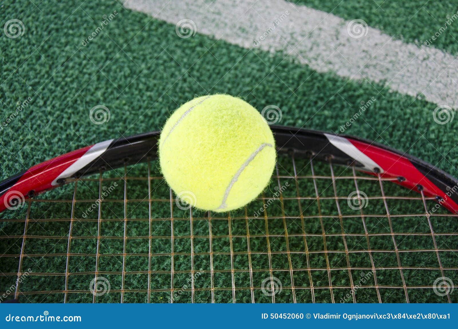Tennis ball on the racket stock photo. Image of tennis - 50452060