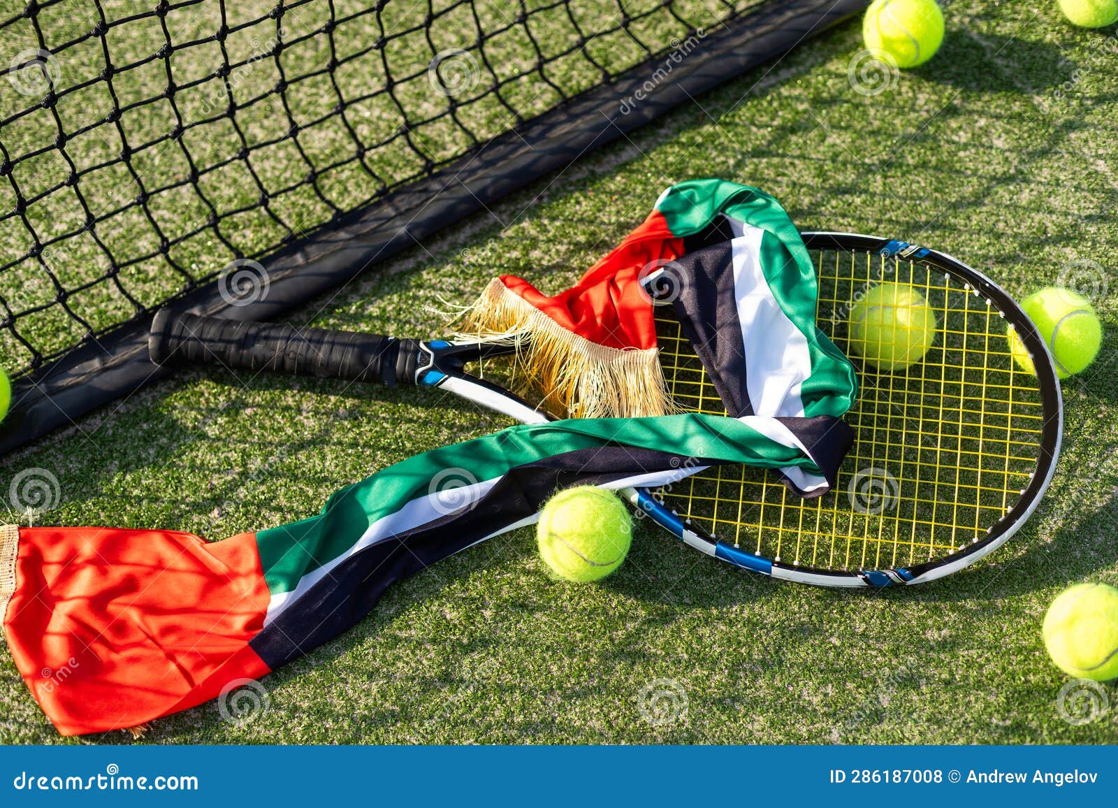 Tennis Ball and Racket on Fresh Green Grass Outdoors Stock Photo ...