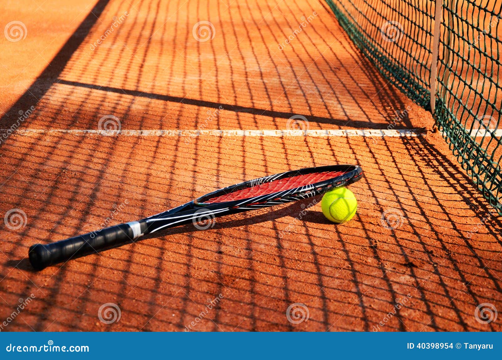 Tennis Ball and Racket are Near the Net Horizontal Stock Photo - Image ...