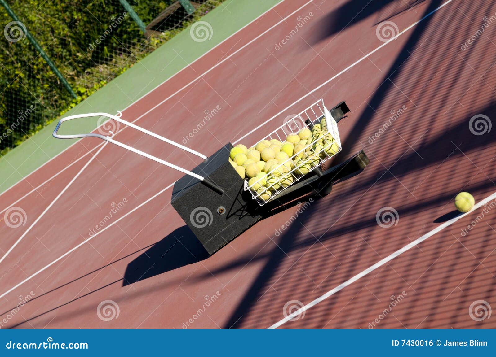 Tennis Ball Sweeper stock photo. Image of collecting, sports - 7430016