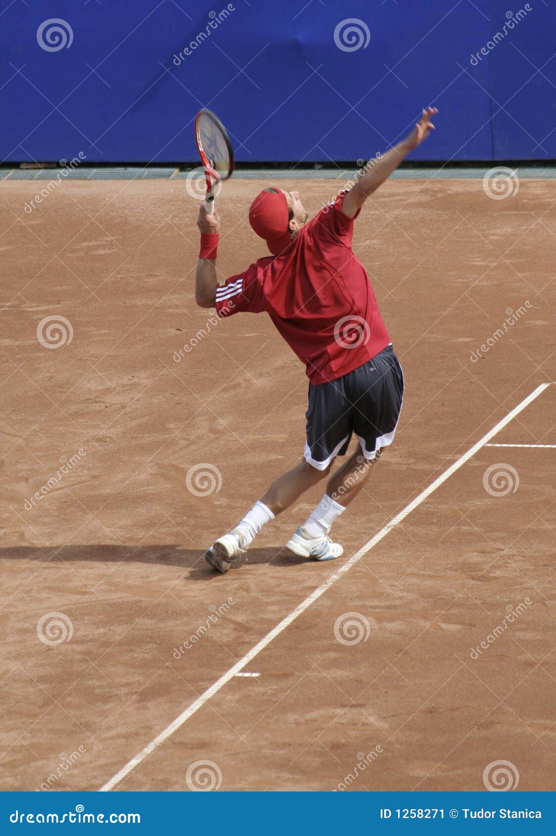 Tennis man serving editorial photo. Image of play, white - 1258271