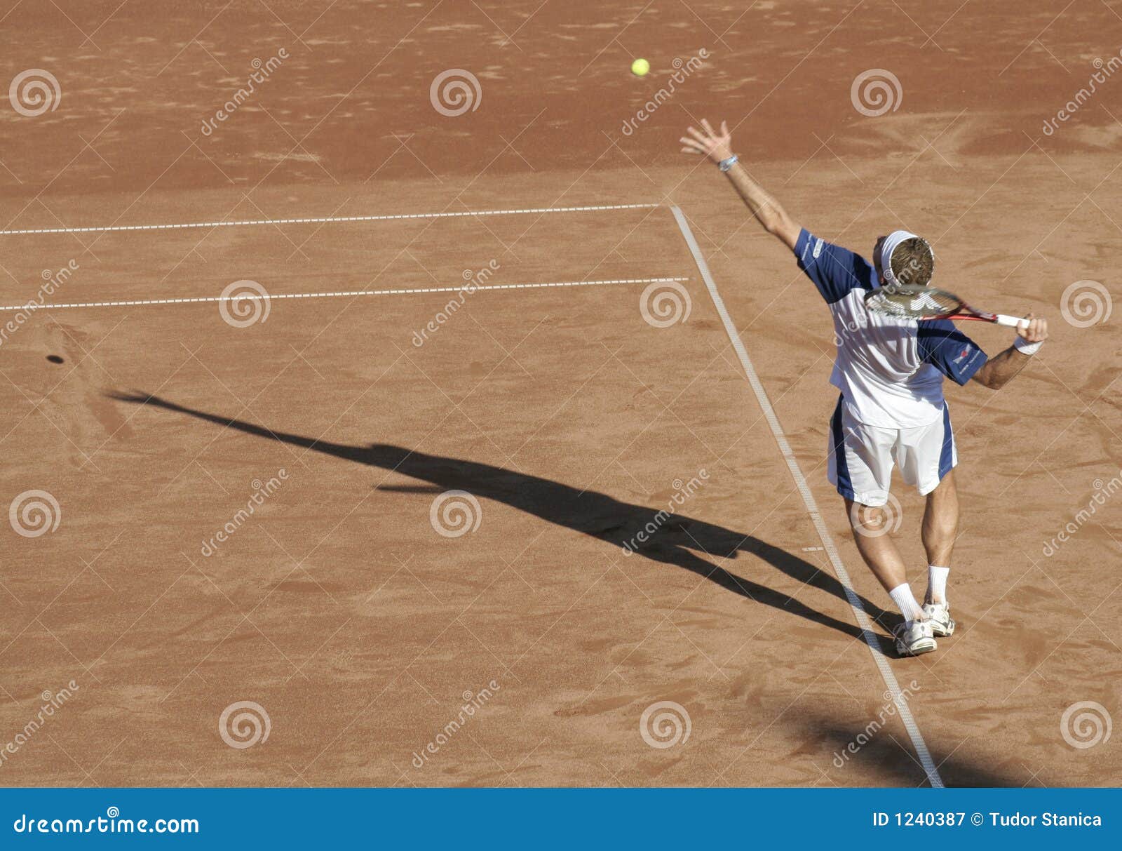 Tennis man serving I stock image. Image of sport, cloth - 1240387