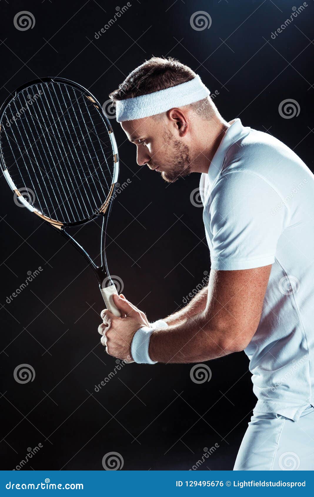 Side View of Concentrated Tennis Player with Tennis Racket Stock Photo ...