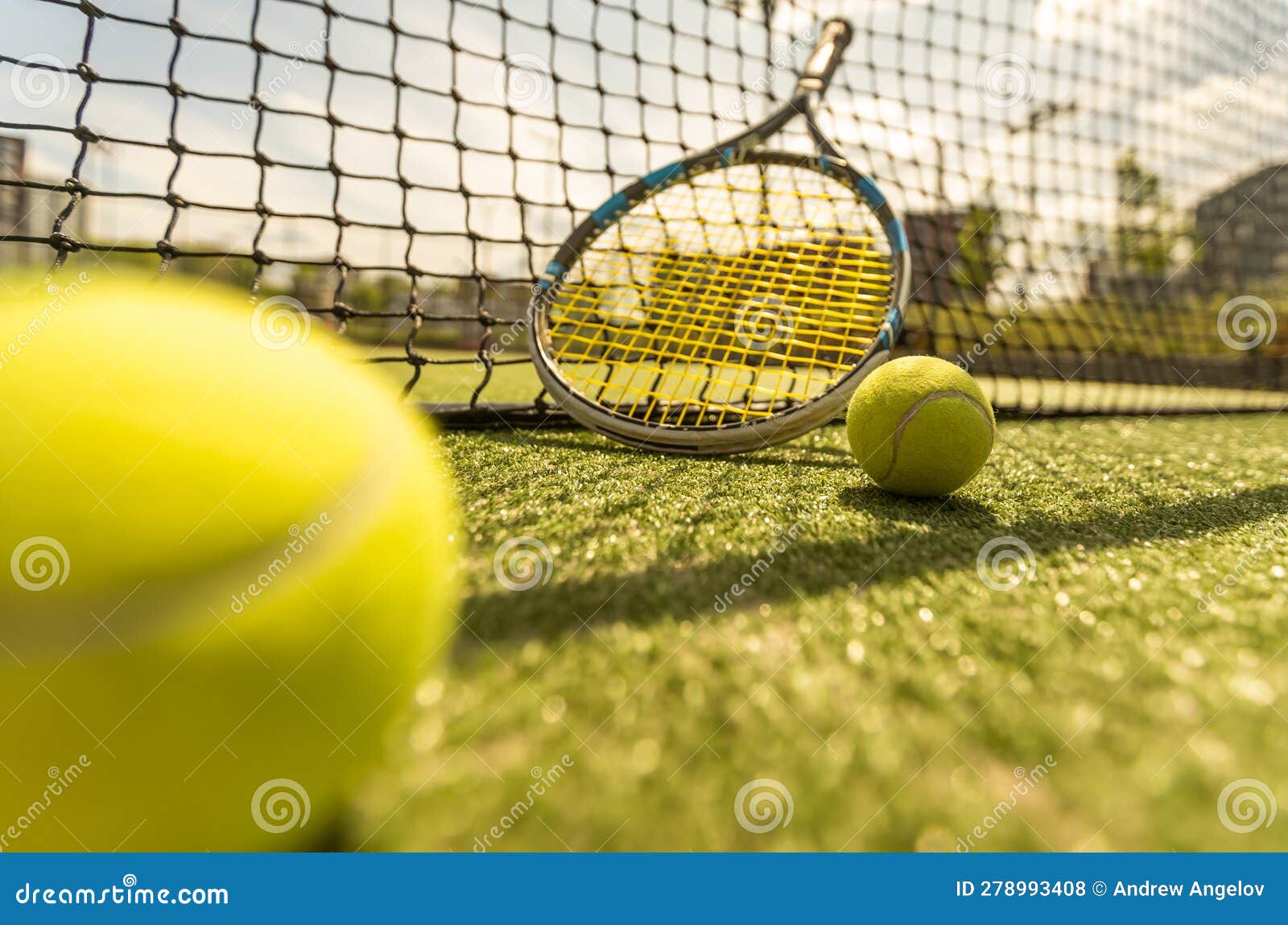 Tennis Racket with a Tennis Ball on a Tennis Court Stock Photo - Image ...