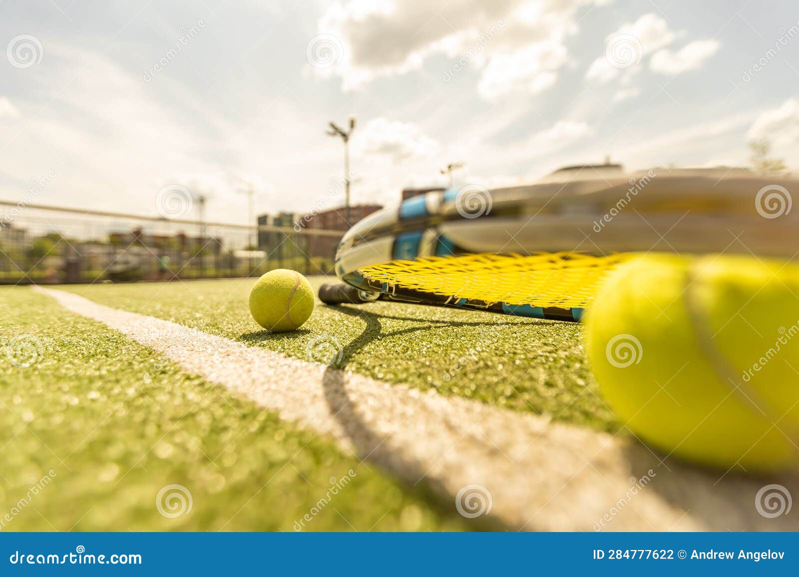 Tennis Racket with a Tennis Ball on a Tennis Court Stock Photo - Image ...