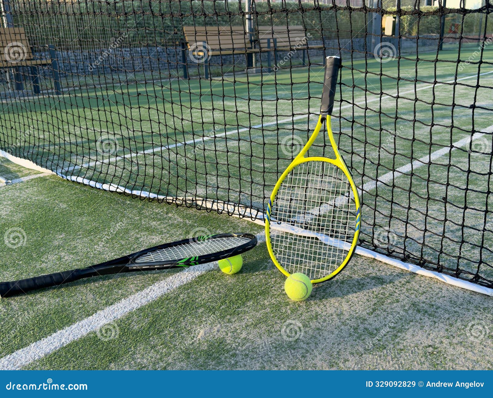Tennis Racket with Balls on a Grass Court Stock Image - Image of ball ...