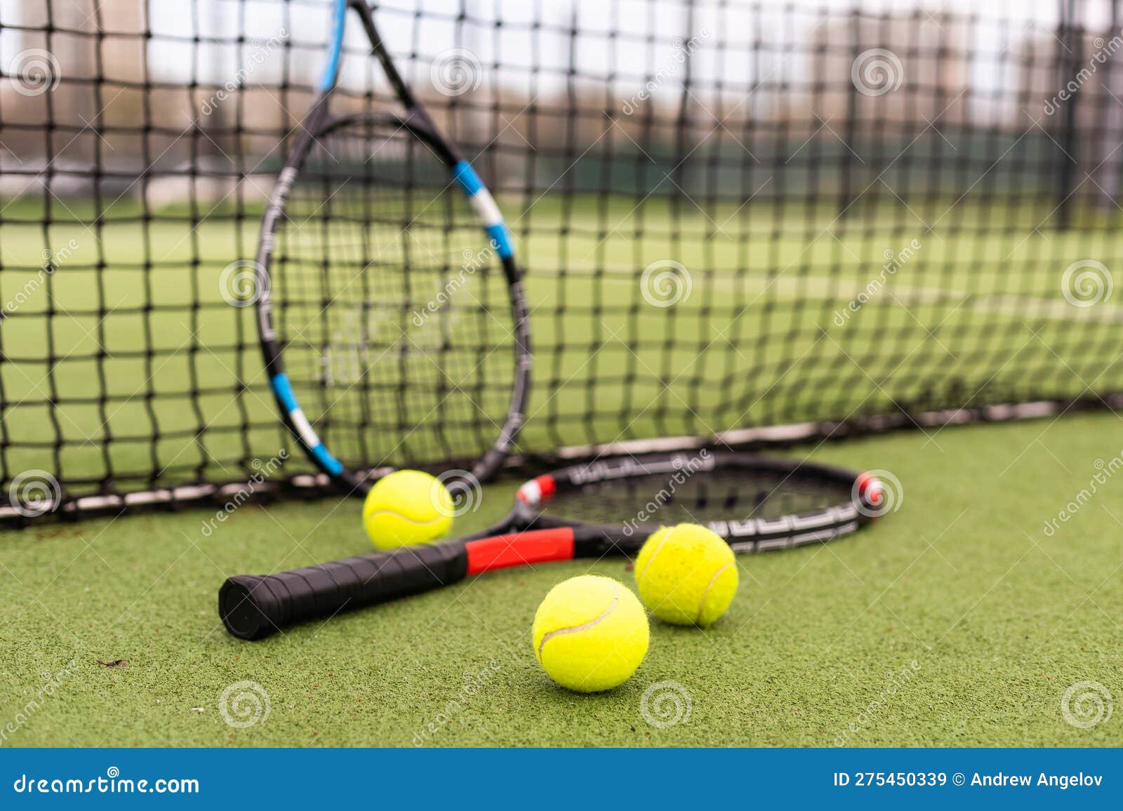 Tennis Racket with Balls on Green Background. Stock Image - Image of ...