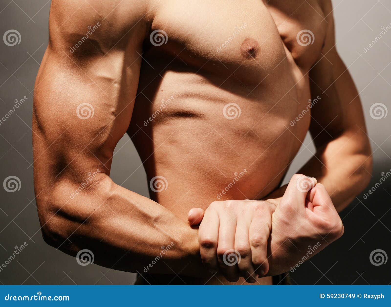 Tense biceps stock image. Image of torso, strength, muscles - 59230749