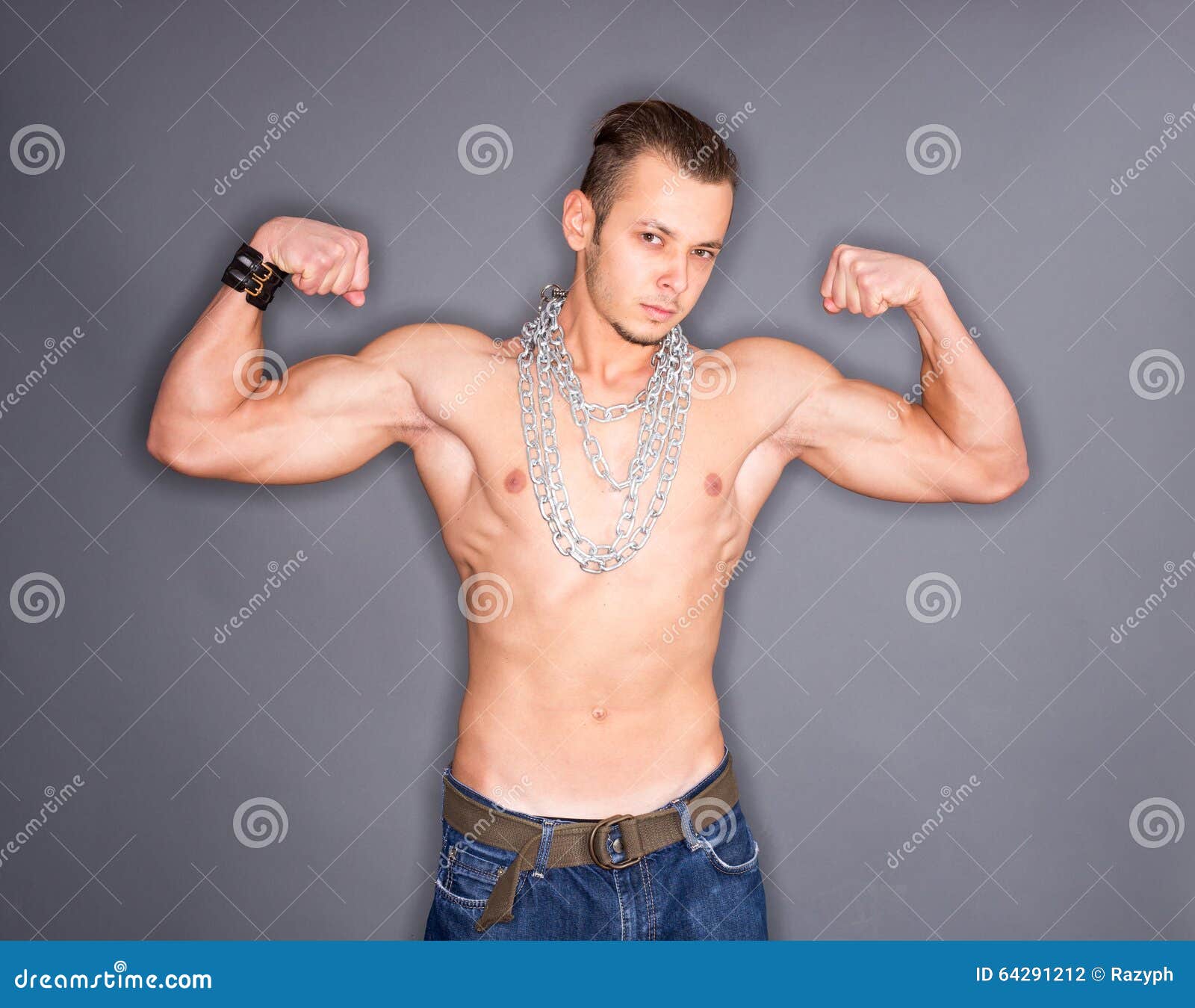 Tense Man with Chains Around Neck Stock Photo - Image of abdominal ...