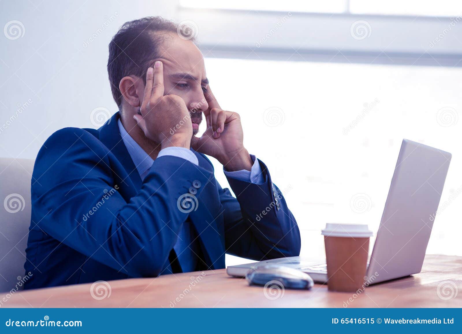 Tensed Businessman Working on Laptop Stock Image - Image of desk ...