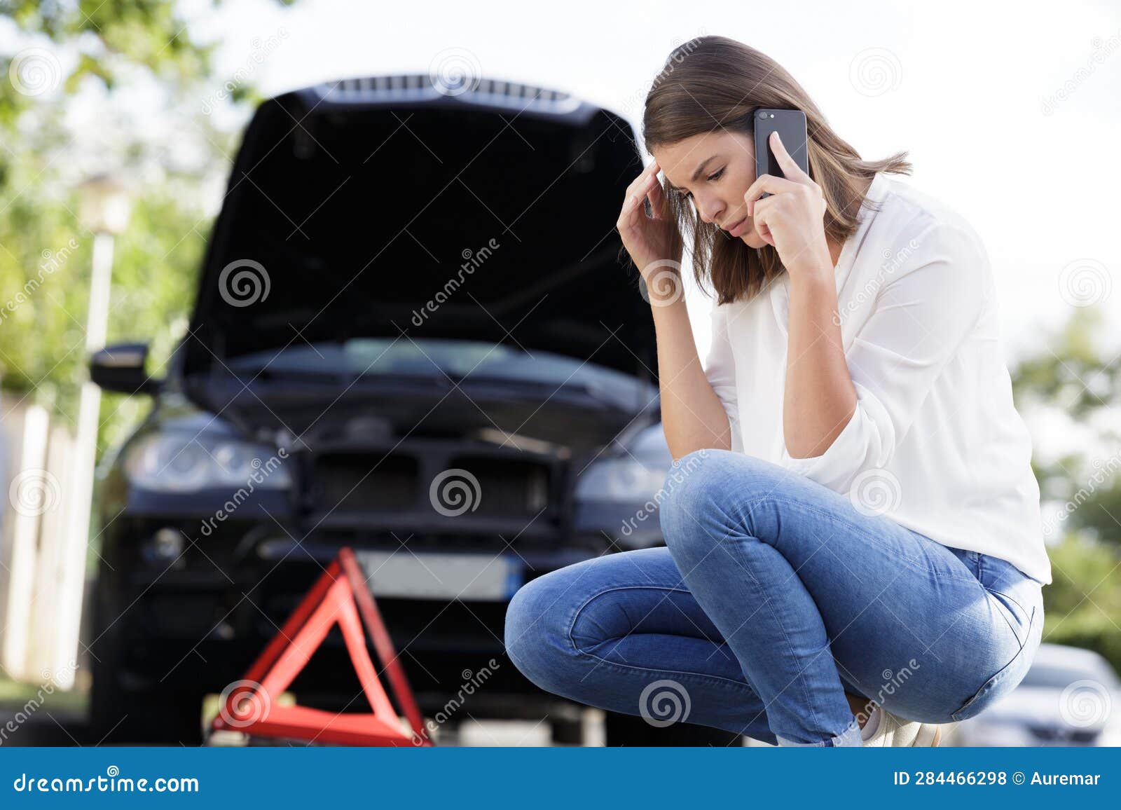 Tensed Woman Using Cell Phone by Broken Down Car Stock Photo - Image of ...