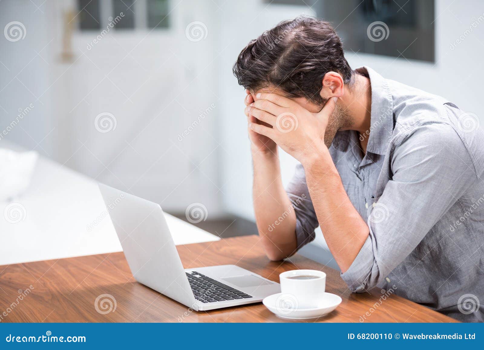 Tensed Young Man with Head in Hands Stock Photo - Image of hands ...