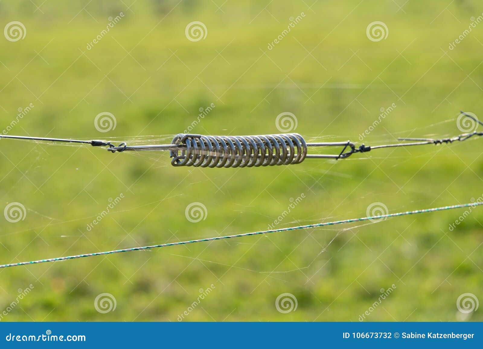 A Spring Tensioning Mechanism That Helps In Opening A Metal Ladder To ...