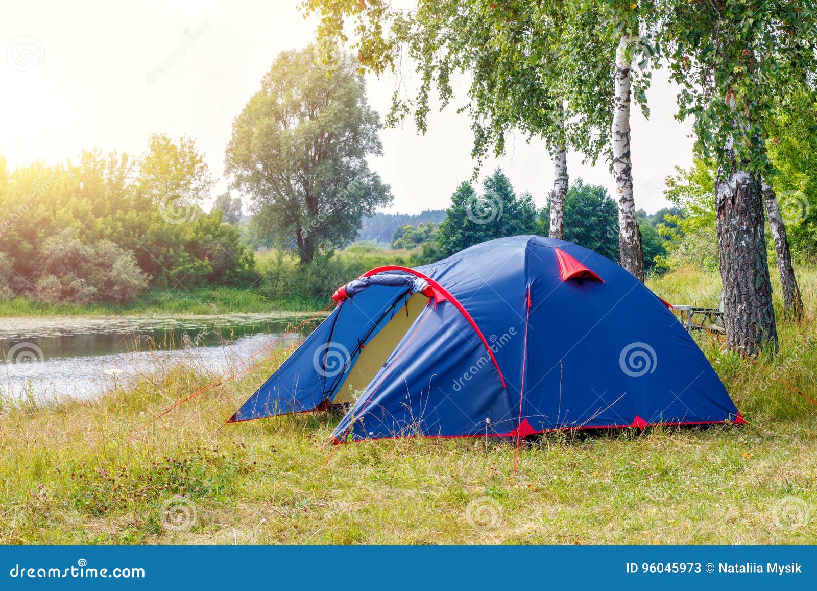 Tent in the Camp Near the River on the Background of Trees. Stock Image ...