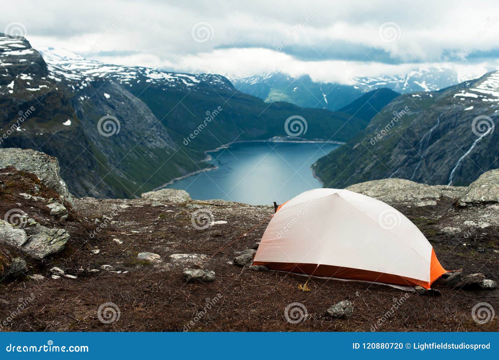 Tent on mountain cliff stock photo. Image of landmark - 120880720