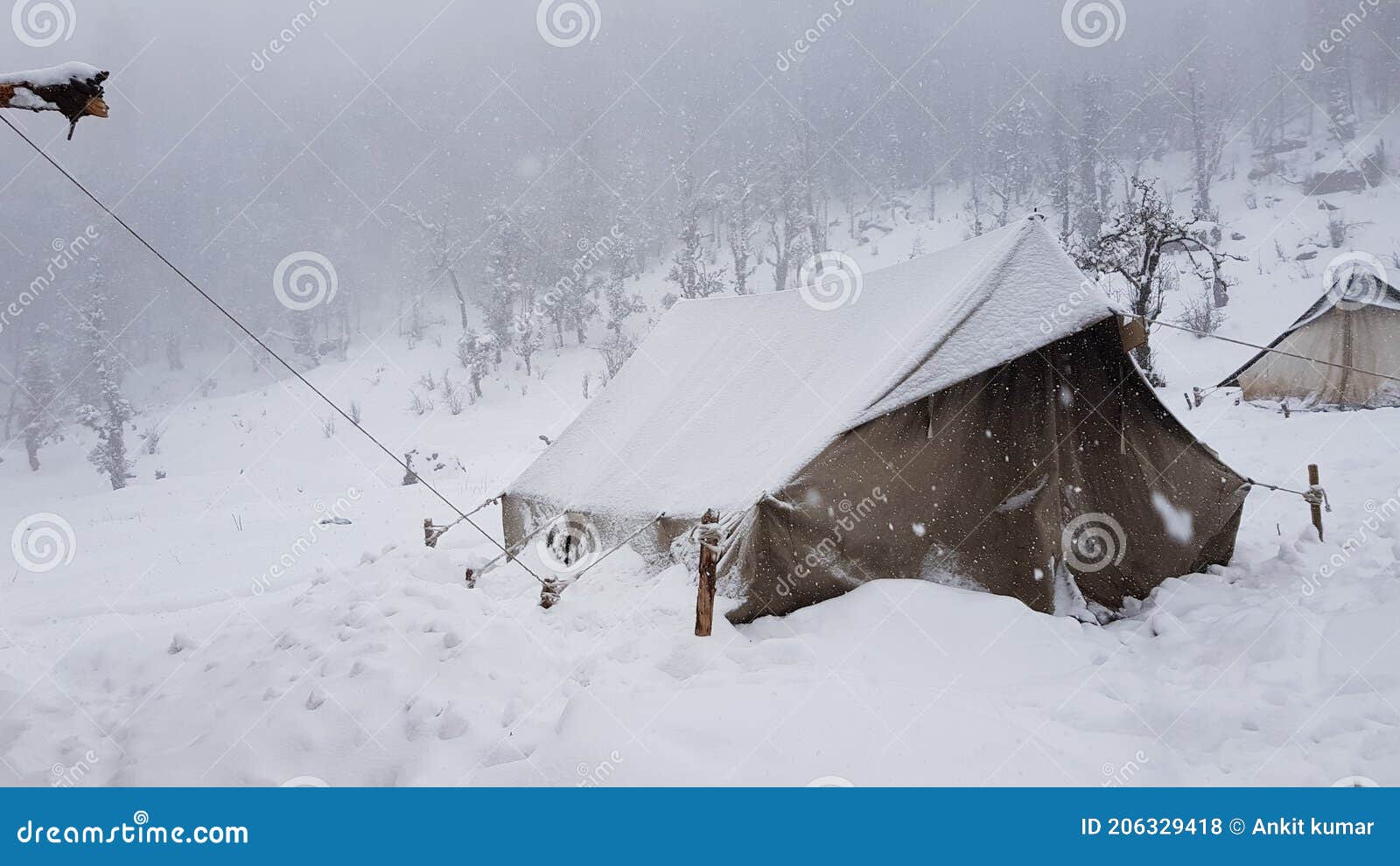 Tent Which is Covered with Heavy Snowfall in a Campsite. Stock Photo ...