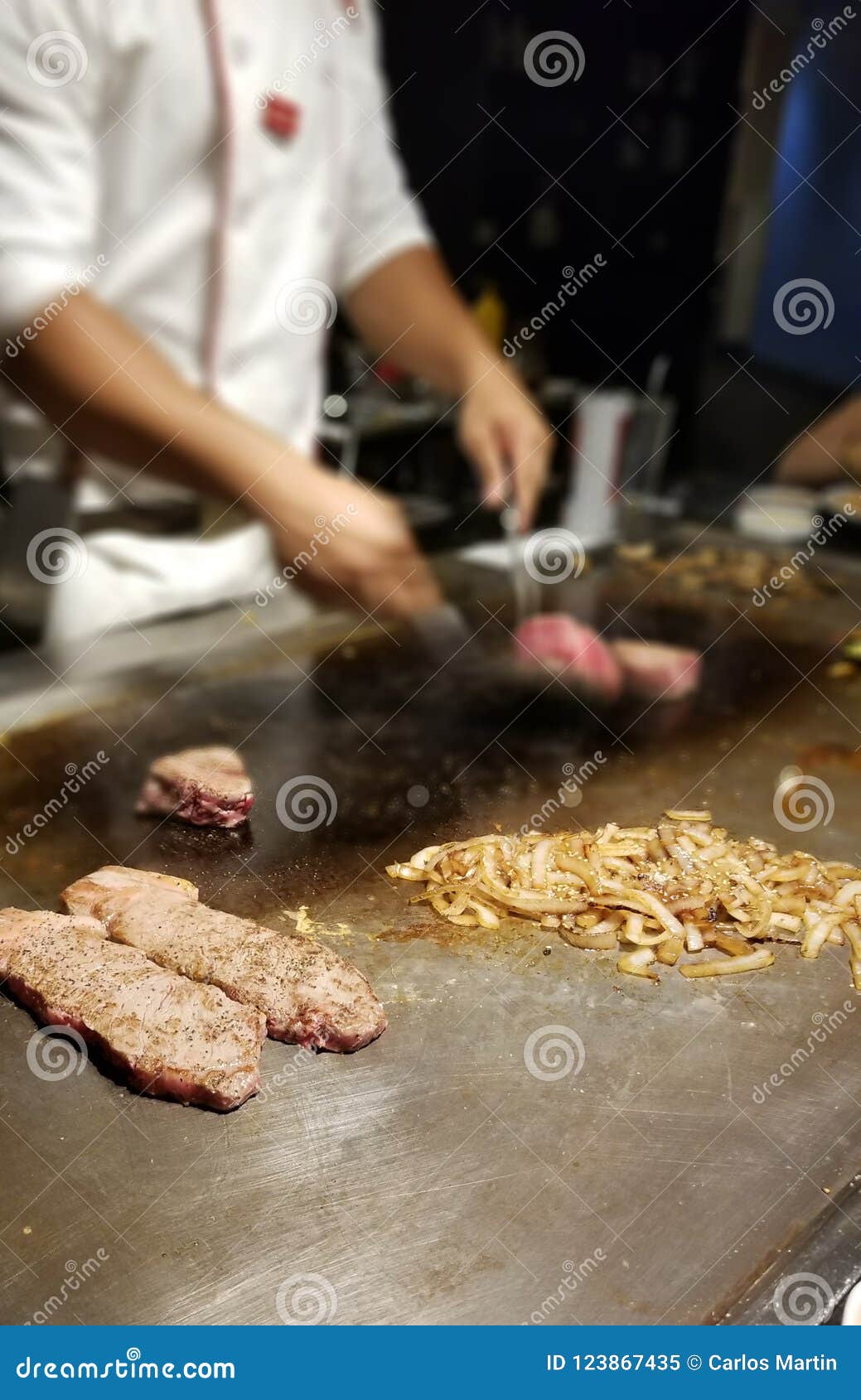 Teppanyaki style cooking stock image. Image of cooking - 123867435