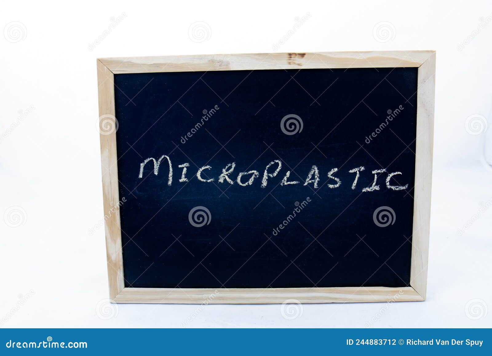 Word MICROPLASTIC Around Small Plastic Particles On A Blue Background ...