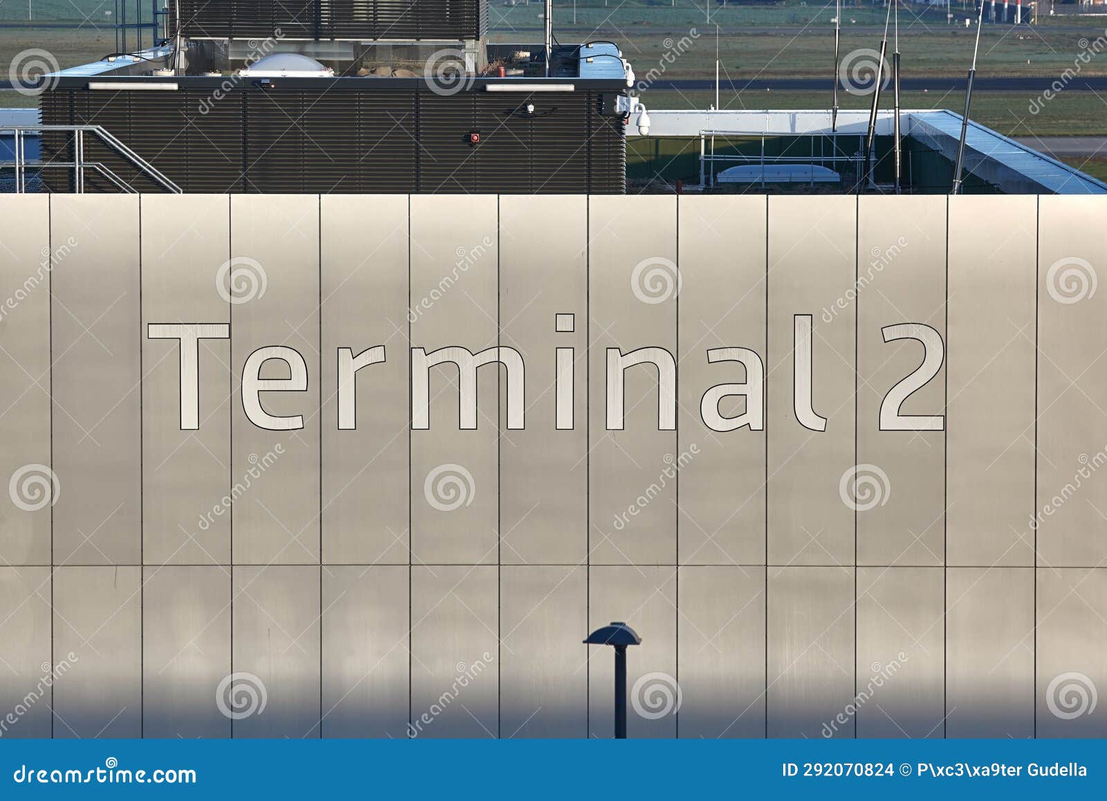 Terminal 2 Sign on Airport Terminal Wall Stock Photo - Image of ...