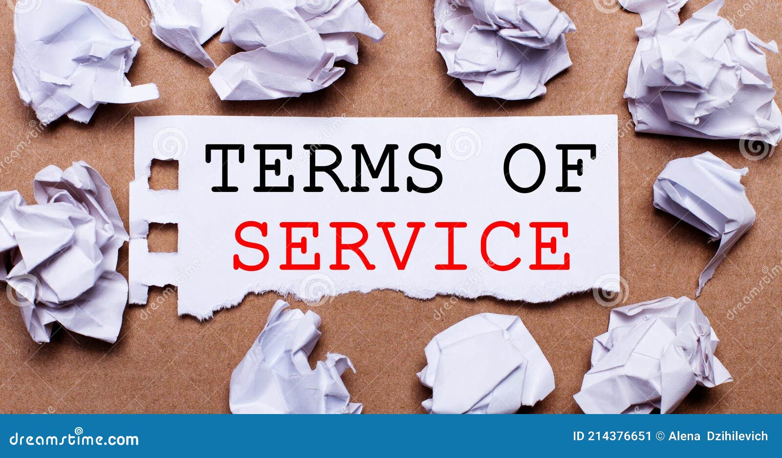 TERMS of SERVICE Written on White Paper on a Light Brown Background ...