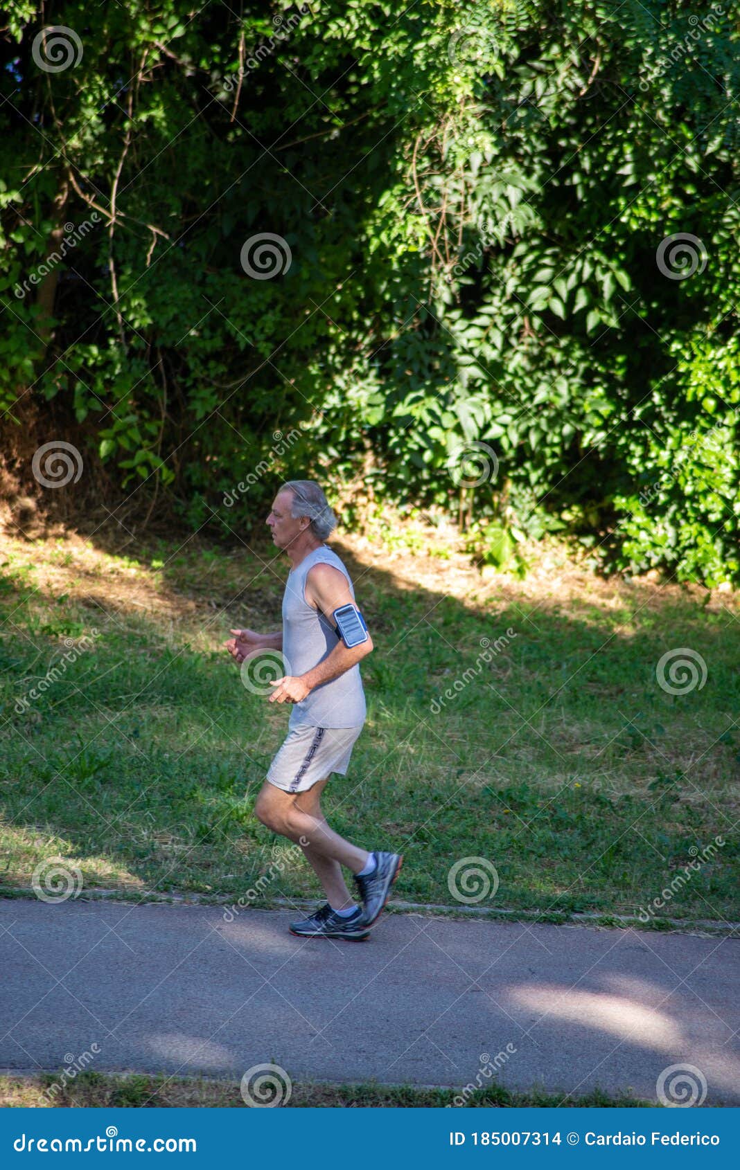 Man Doing Physical Activity at the Park Editorial Stock Image - Image ...