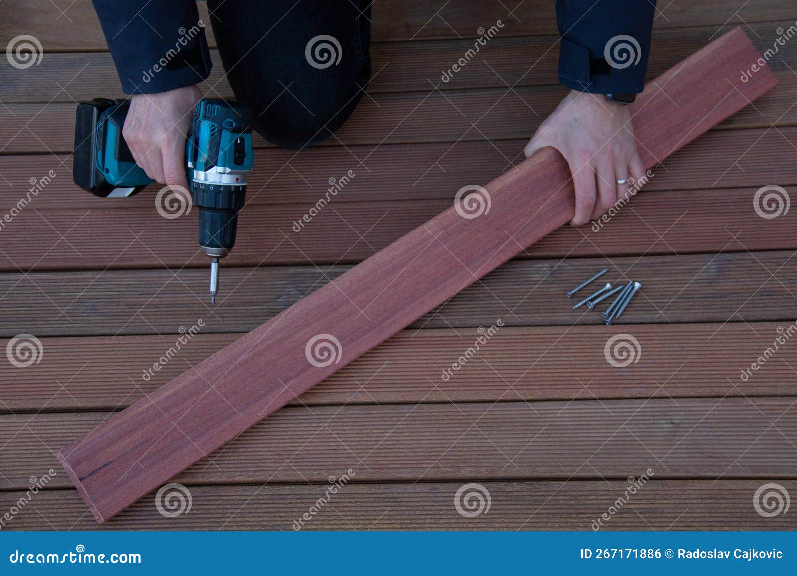 Terrace Deck Construction, Carpenter Holding Tools and Ipe Timber Board ...