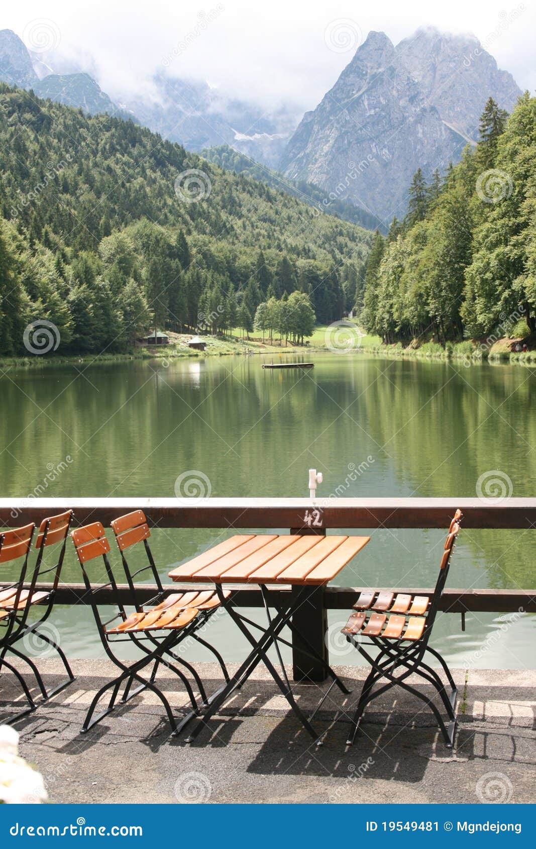 Terrace in the german Alps stock image. Image of chairs - 19549481