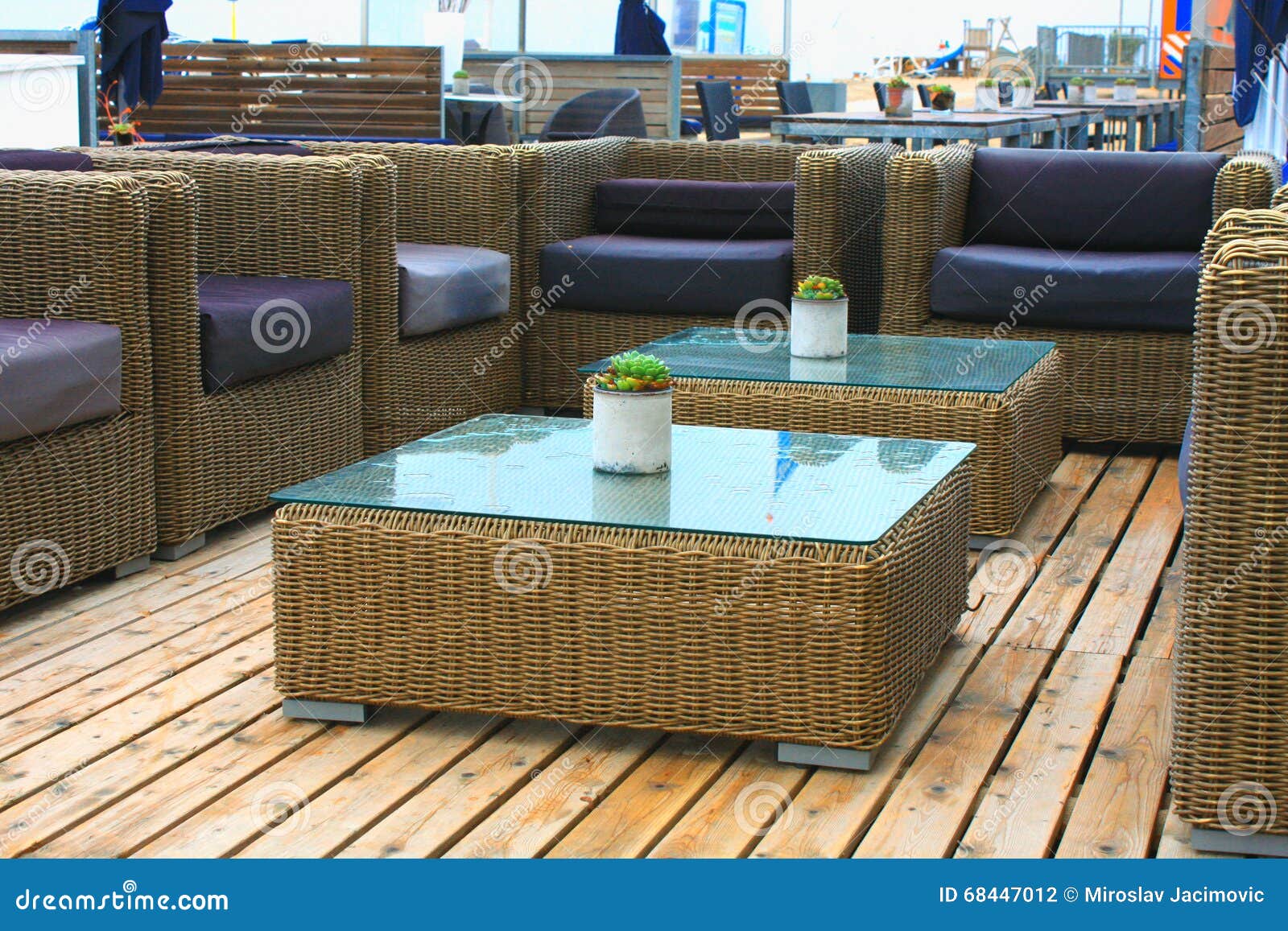 Terrace Lounge with Rattan Armchairs on Beach Stock Photo - Image of ...