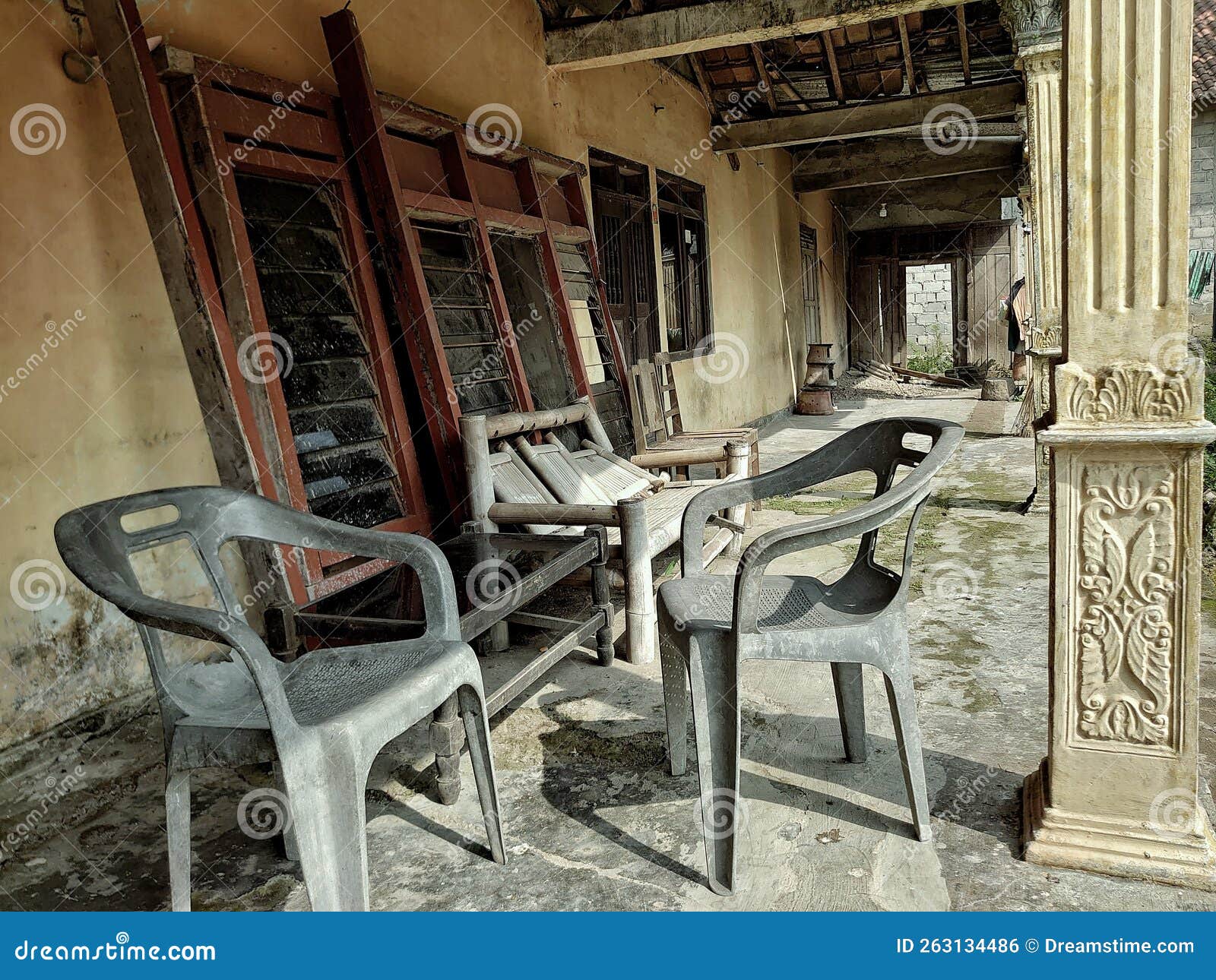 Sun Terrace Of The Abandoned Hotel In Angkor Style. Style Of The Temple ...