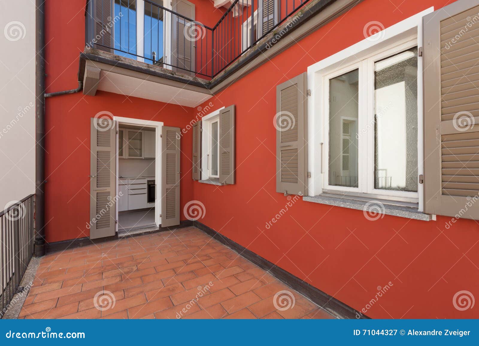 Terrace of a red house stock image. Image of classical - 71044327