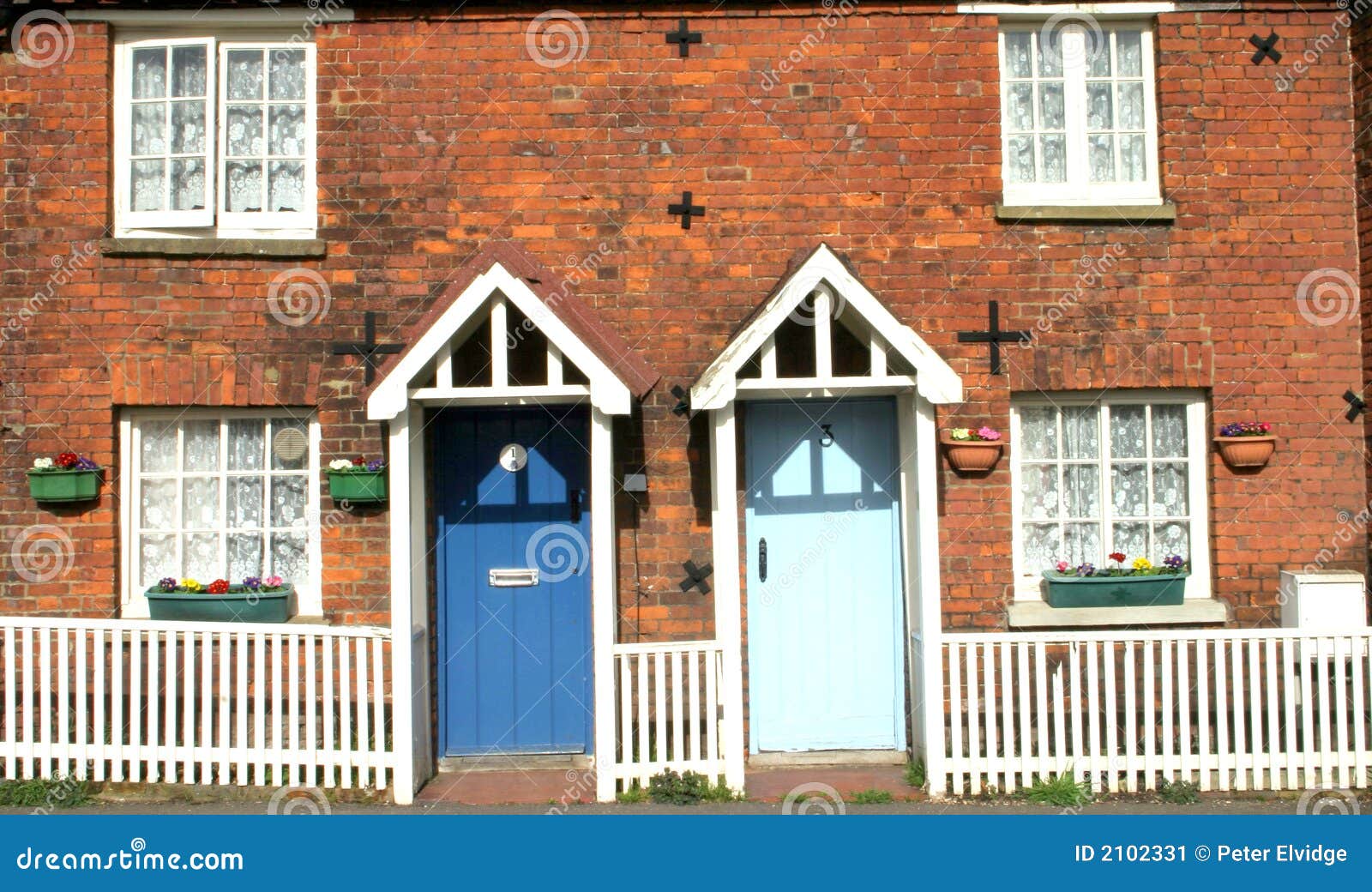 Terraced Cottages stock image. Image of fence, home, door - 2102331