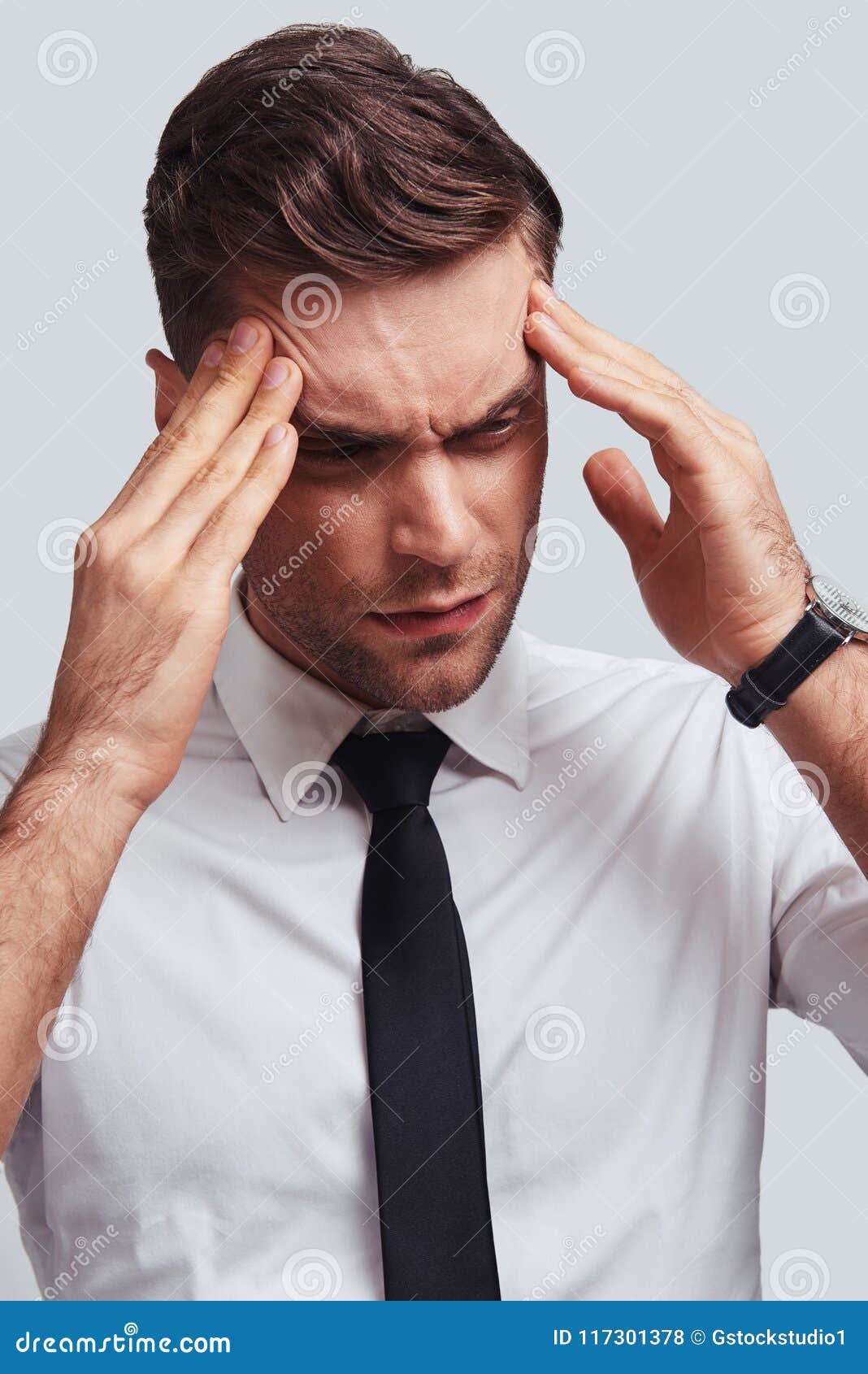 Terrible Headache. Man Having A Headache. Young Man Suffering From ... Terrible Headache. Man Having A Headache. Young Man Suffering From ...