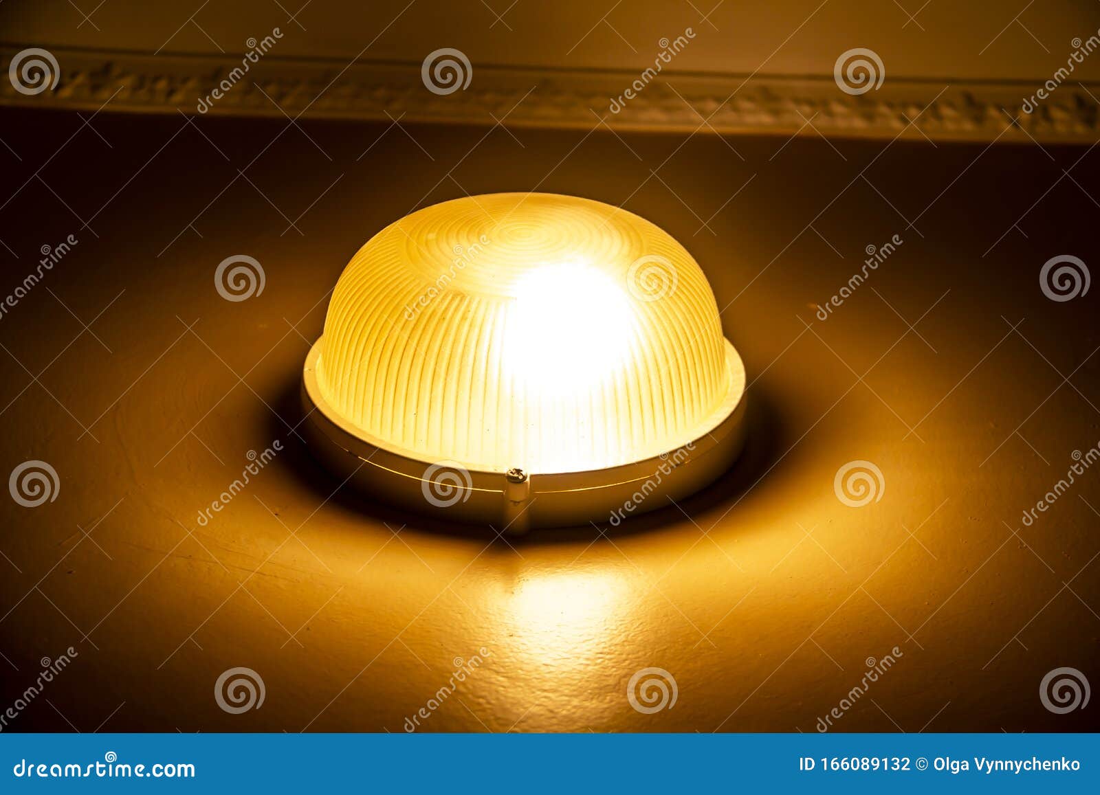 A Terrible Light on the Wall. the Old Lamp on the Wall with Yellow ...
