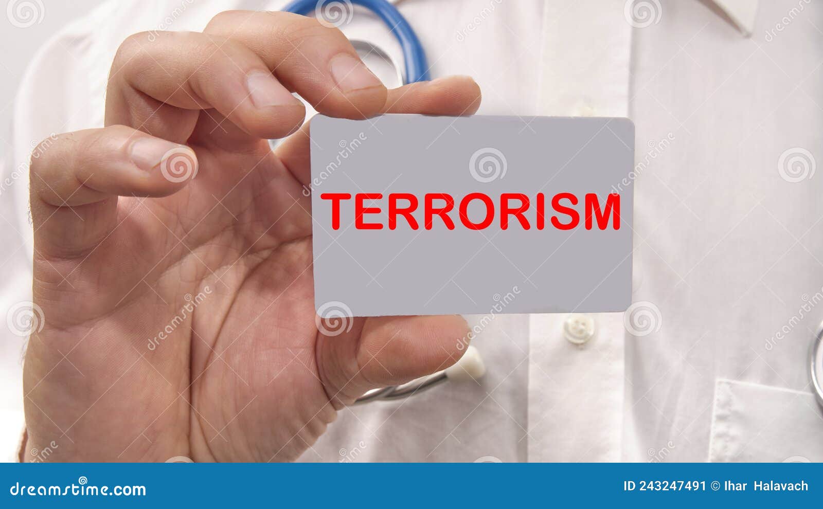 TERRORISM the Text on the Card in the Man& X27;s Hand .Concept of ...