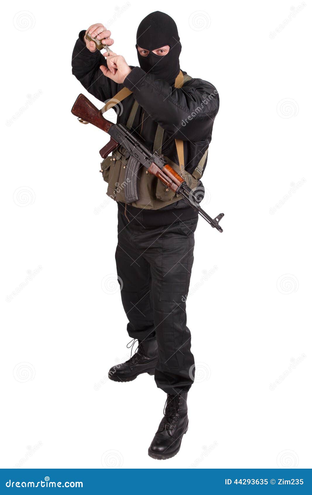 Terrorist in Black Uniform and Mask with Kalashnikov and Hand Grenade ...