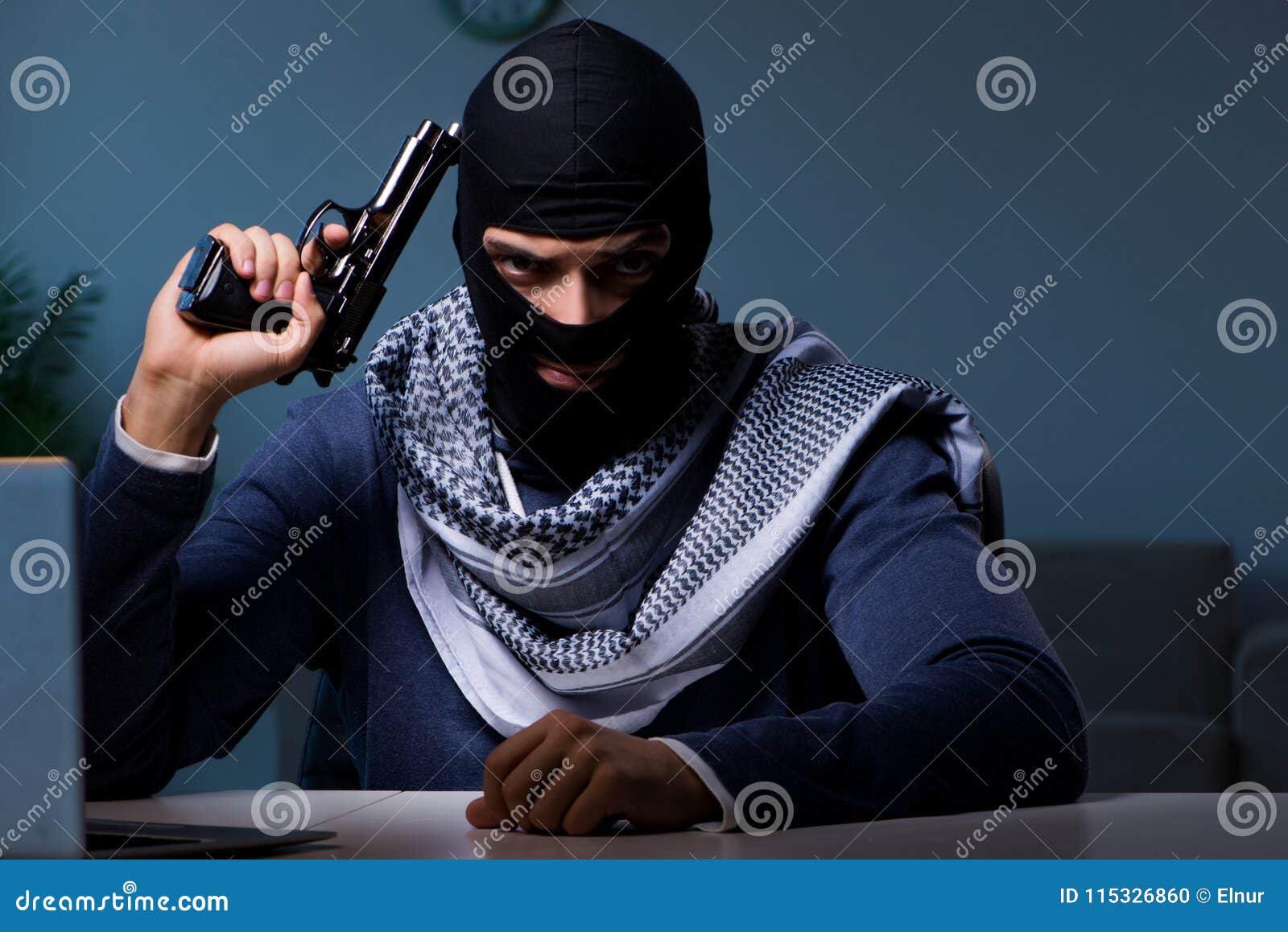 The Terrorist Burglar with Gun Working at Computer Stock Photo - Image ...