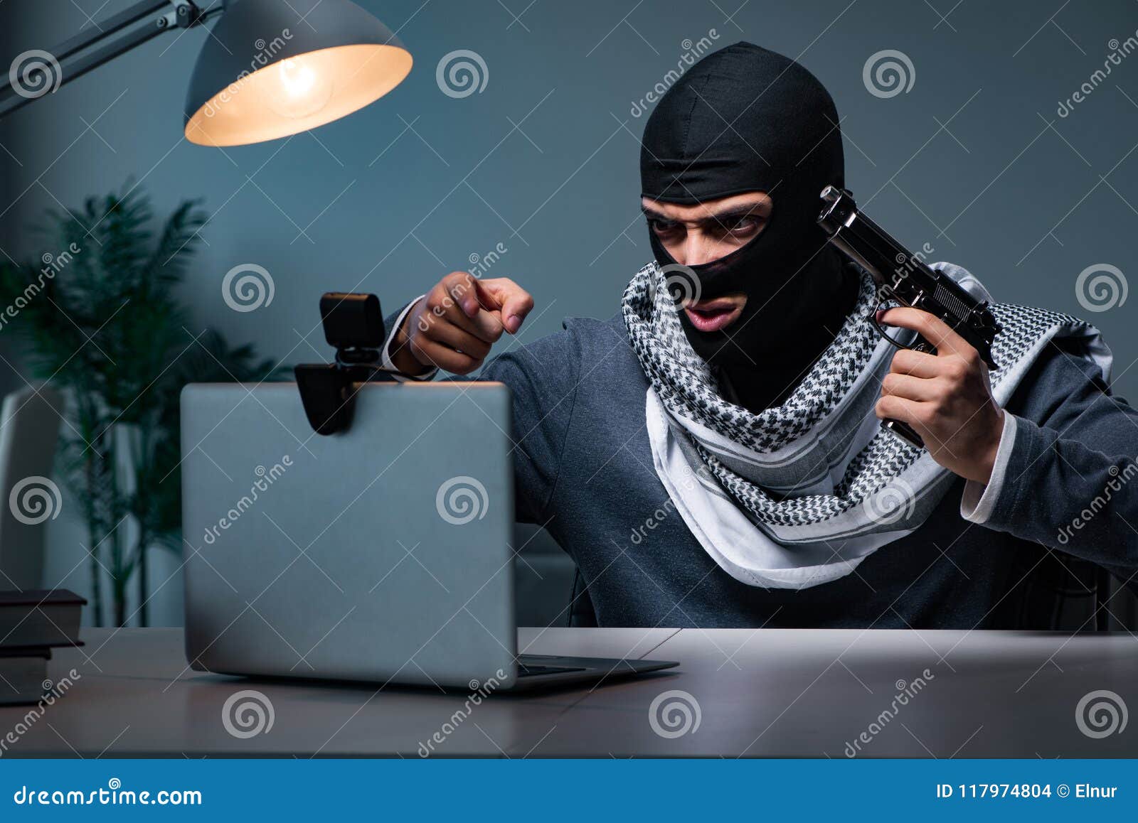 The Terrorist Burglar with Gun Working at Computer Stock Photo - Image ...