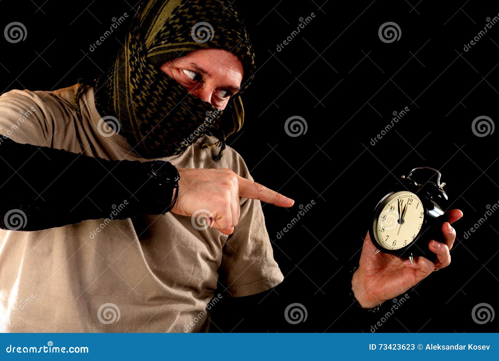 Terrorist with a clock stock image. Image of anonymous - 73423623