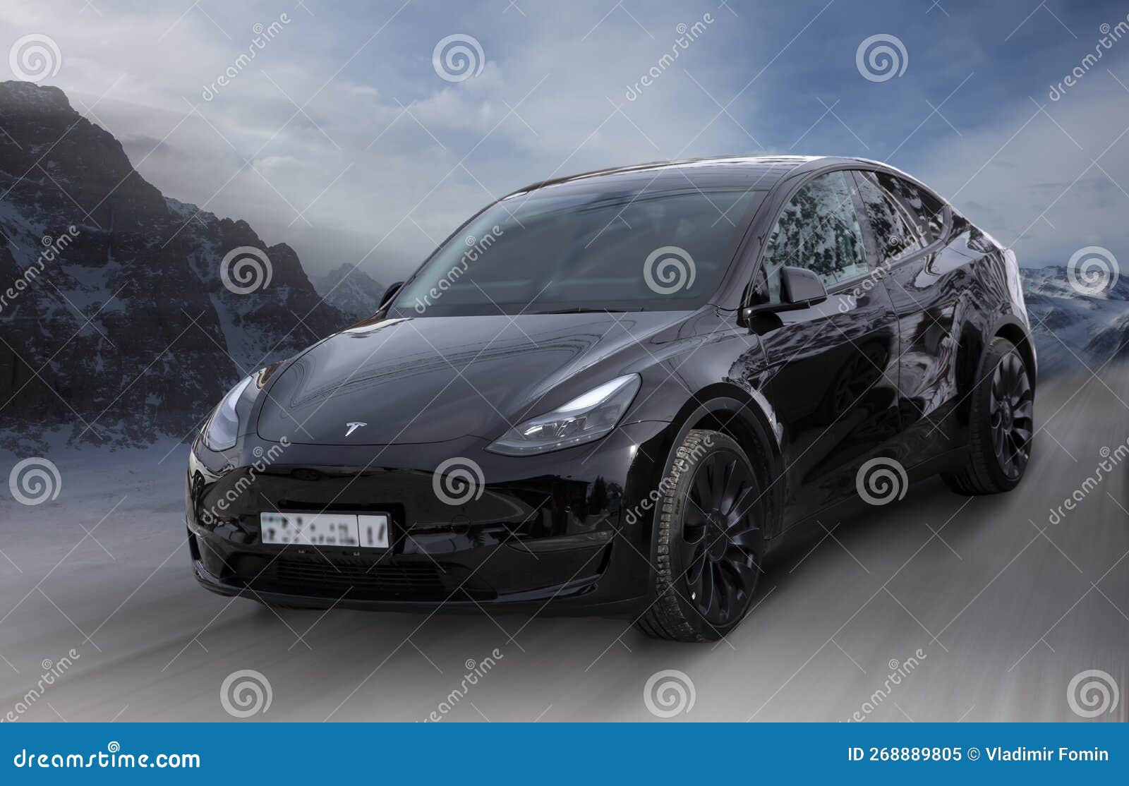 Tesla black electric car. editorial image. Image of clouds - 268889805