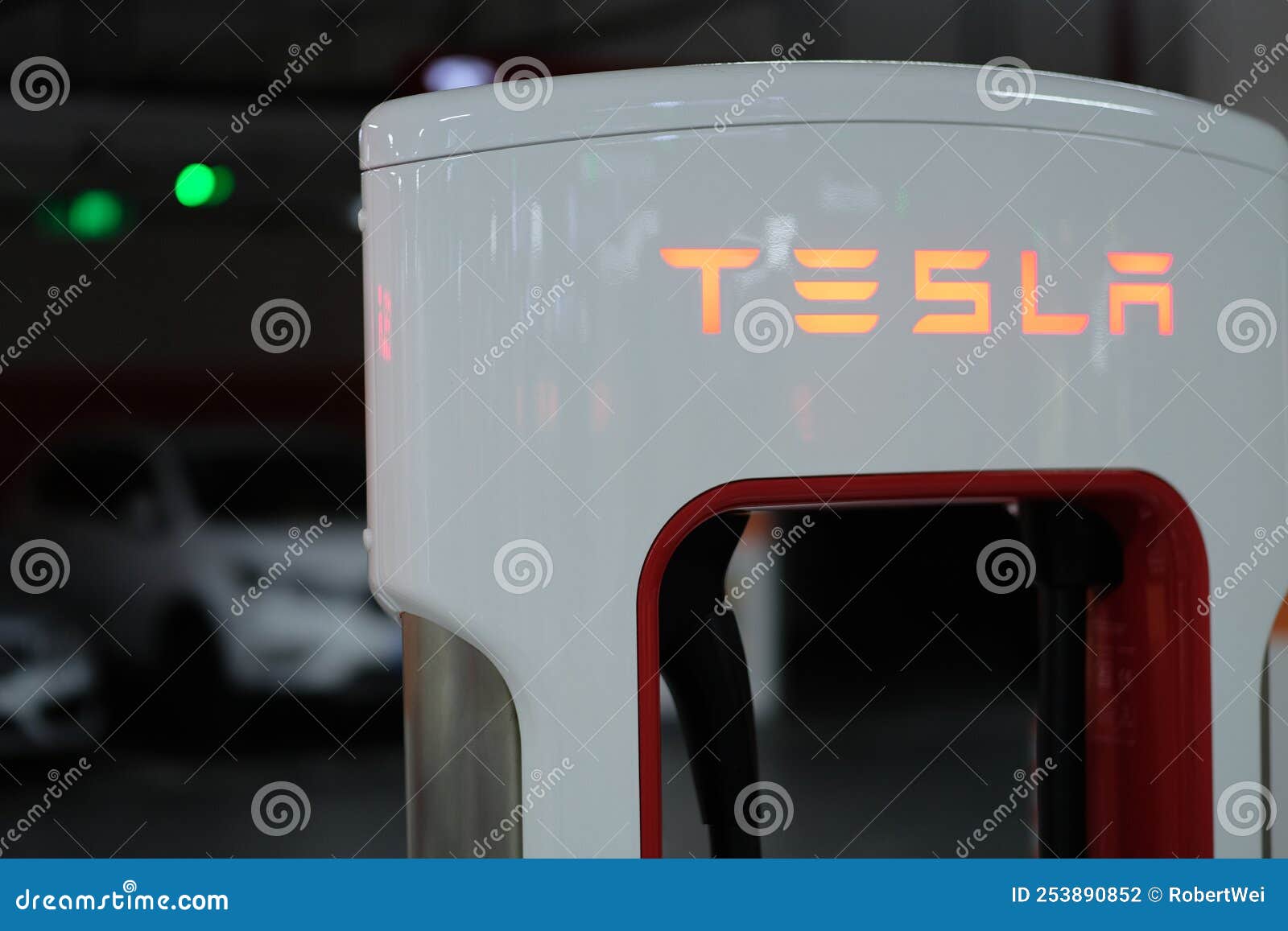Tesla Brand Logo On A Row Of Charging Piles Editorial Photo ...