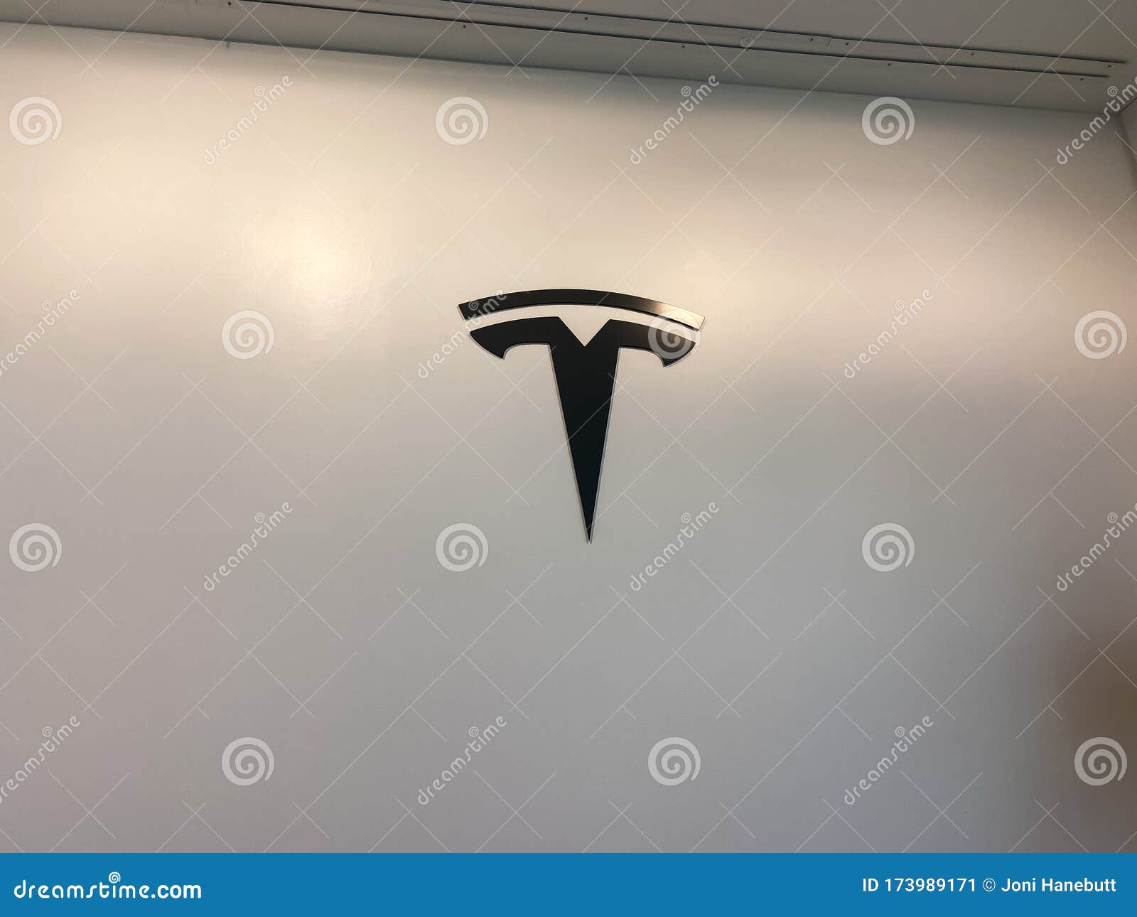 The Tesla Logo on the Wall at a Tesla Retail Store Editorial Photo ... The Tesla Logo on the Wall at a Tesla Retail Store Editorial Photo ...