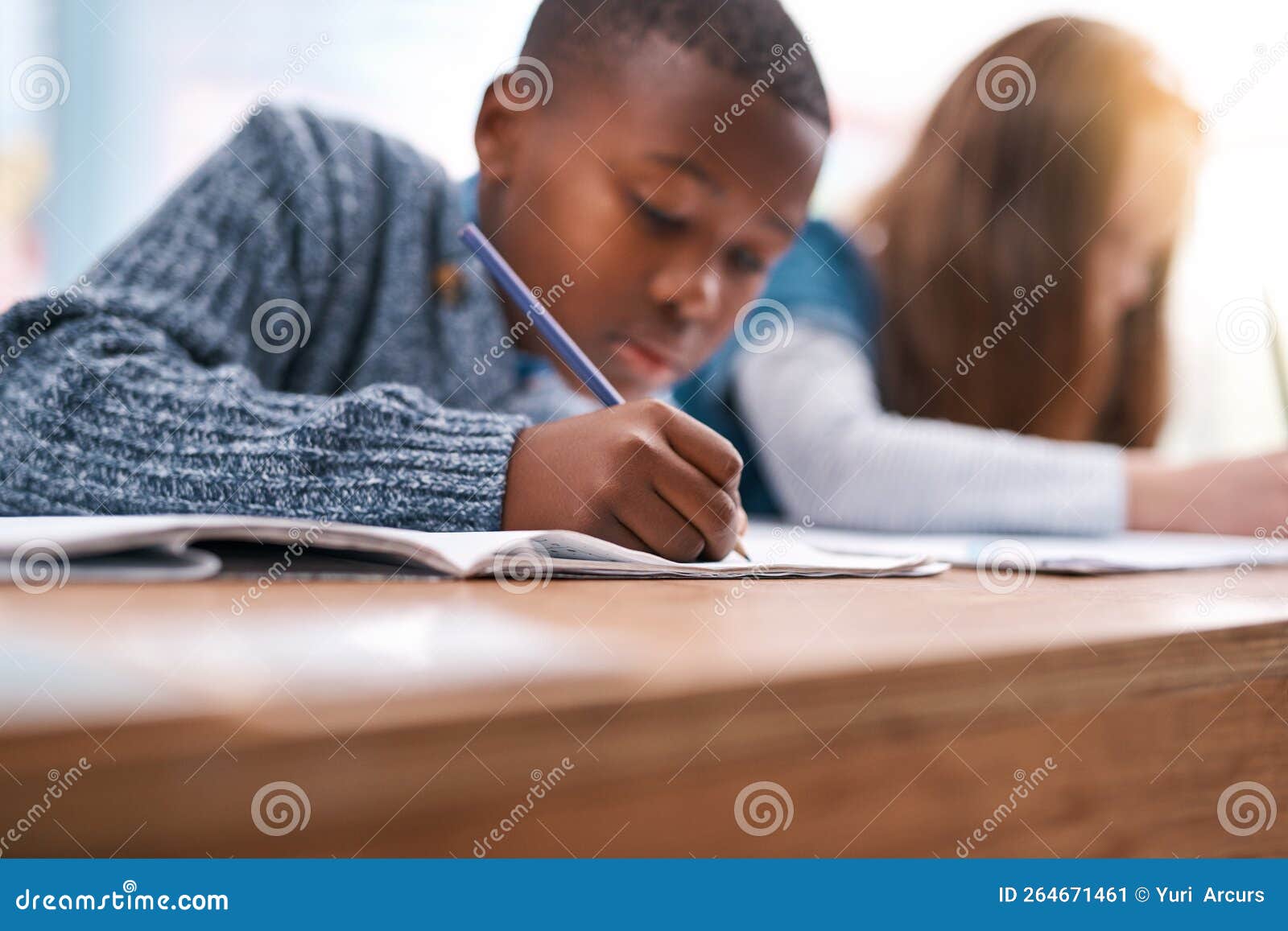 This Test is Easy. Two Elementary School Kids Doing School Work Inside ...