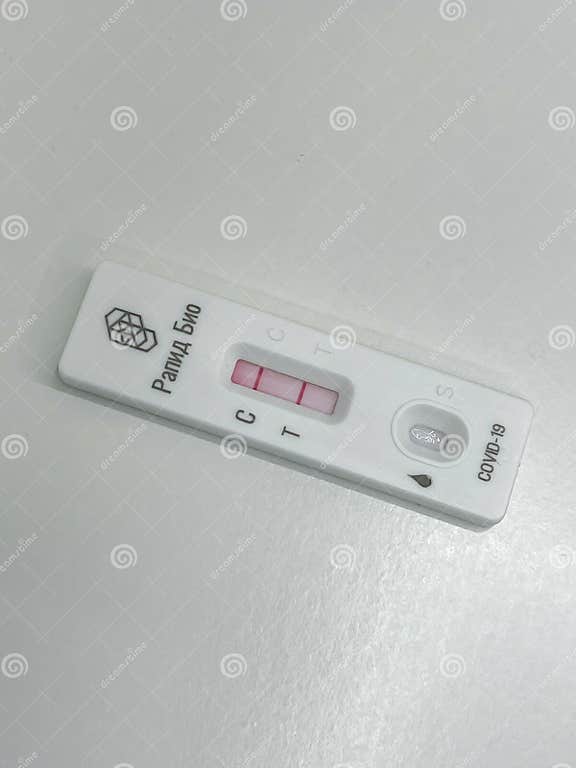 Test Positive Using a COVID-19 Rapid Testing Device Stock Image - Image ...