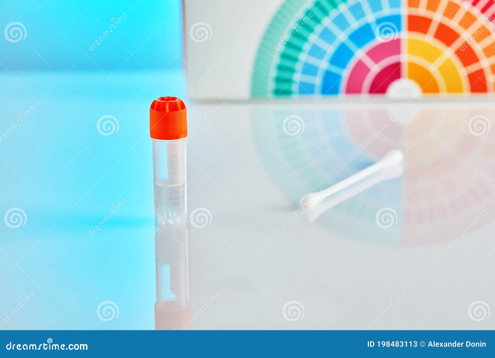 A Test Tube with a Liquid for DNA Analysis and a Stick Against the ...