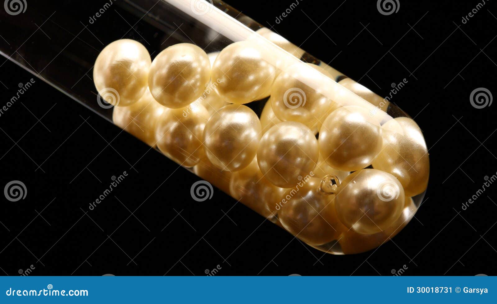 Pearls in tube stock image. Image of jewelry, creation - 30018731