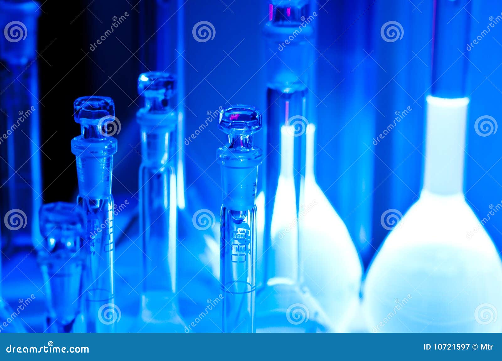Test tubes in blue light stock image. Image of demonstration - 10721597