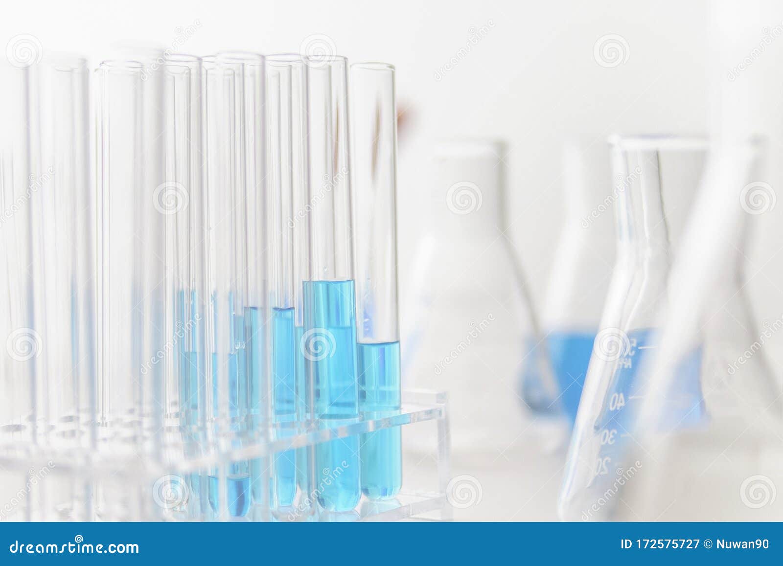 Test Tubes and Flasks with Blue Liquid in a Laboratoy Stock Image ...