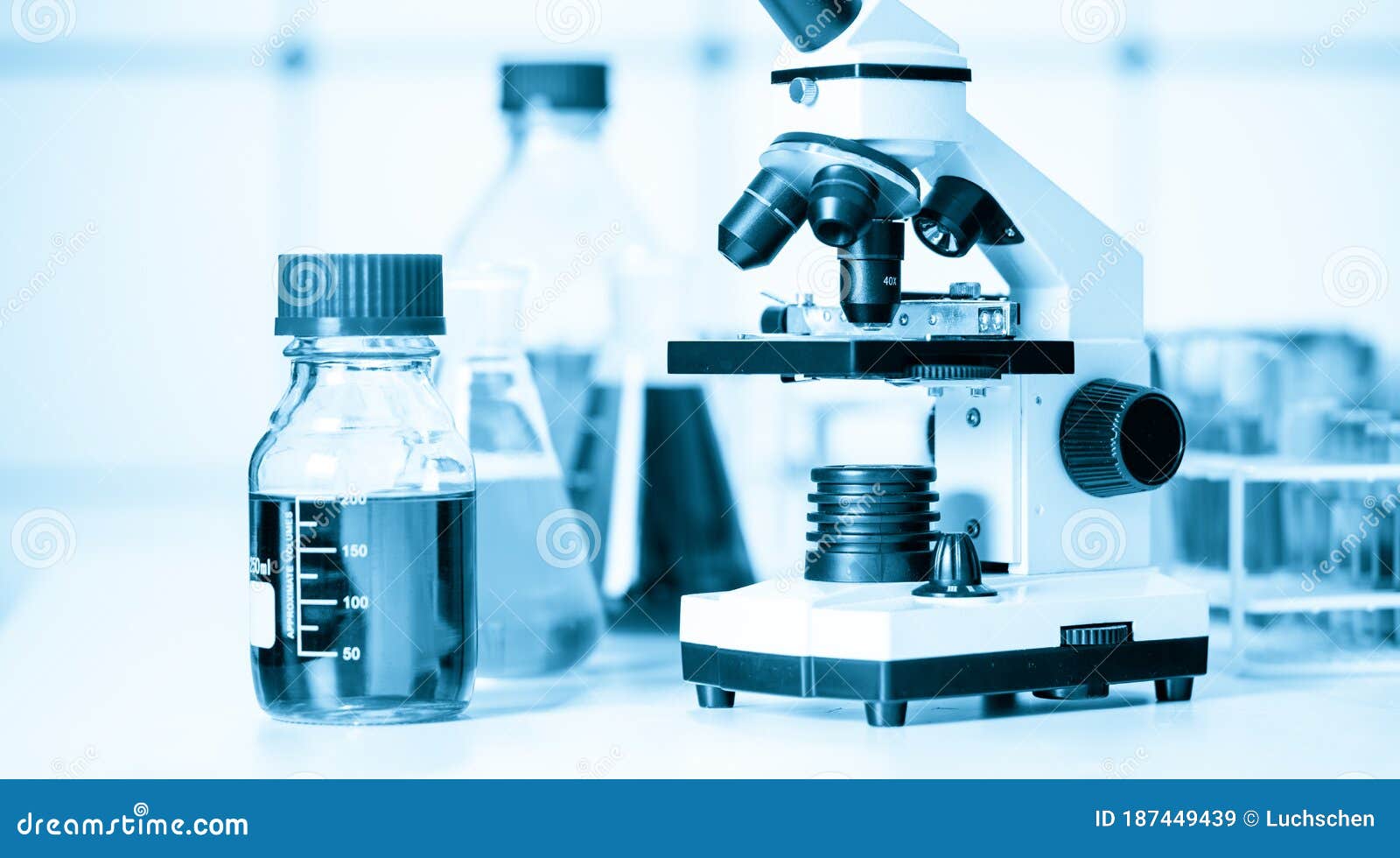 Test Tubes and Flasks and Microscope in a Chemical Laboratory Stock ...