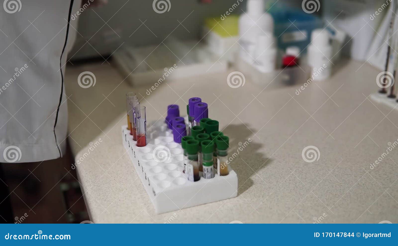 Test Tubes are Getting Inserted into a Biochemical Analyzer Stock ...